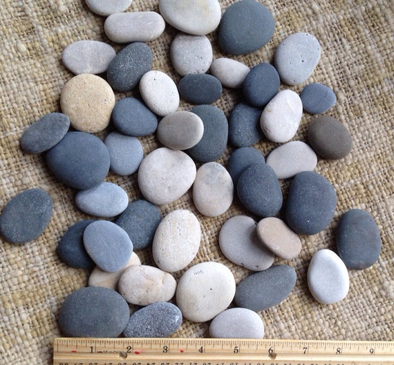 Smooth flat round lake rocks