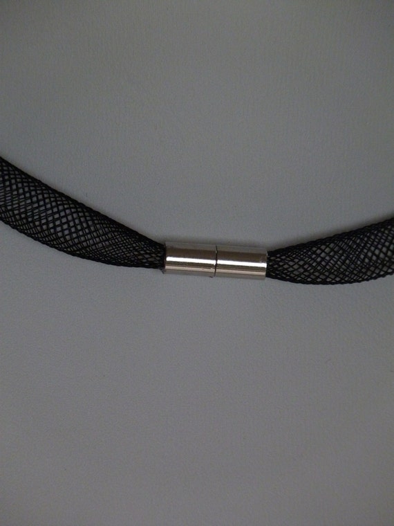 Black mesh tube necklace with silver plated hollow twist wire
