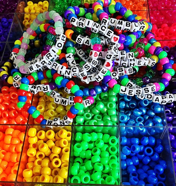 Items similar to 10 Random Kandi Singles with Charms and/or Words! on Etsy