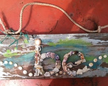 Popular items for shell sign on Etsy