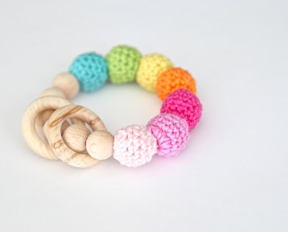 Multicolor nursing bracelet. Girlish rattle for baby. Teething