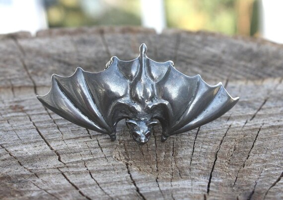 irc black silver bat wing with ruby eyes