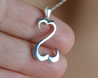 Two hearts pendant | Etsy