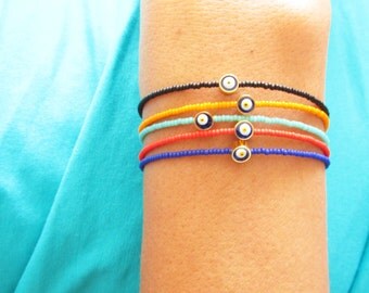 Evil eye bracelet in assorted colors wholesale jewelry swarovski eye ...