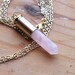 Rose Quartz Bullet Point Crystal Necklace Gold Casing and