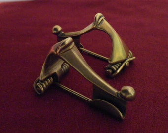 Pair of 3/4 Small Penannular Brooches by TwilightForge on Etsy