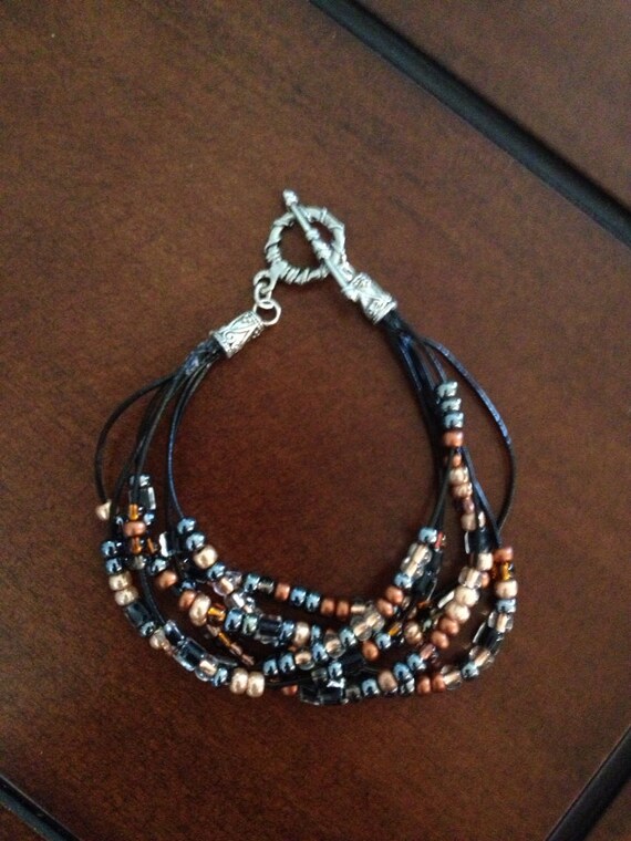 Items similar to Multi strand beaded bracelet on Etsy