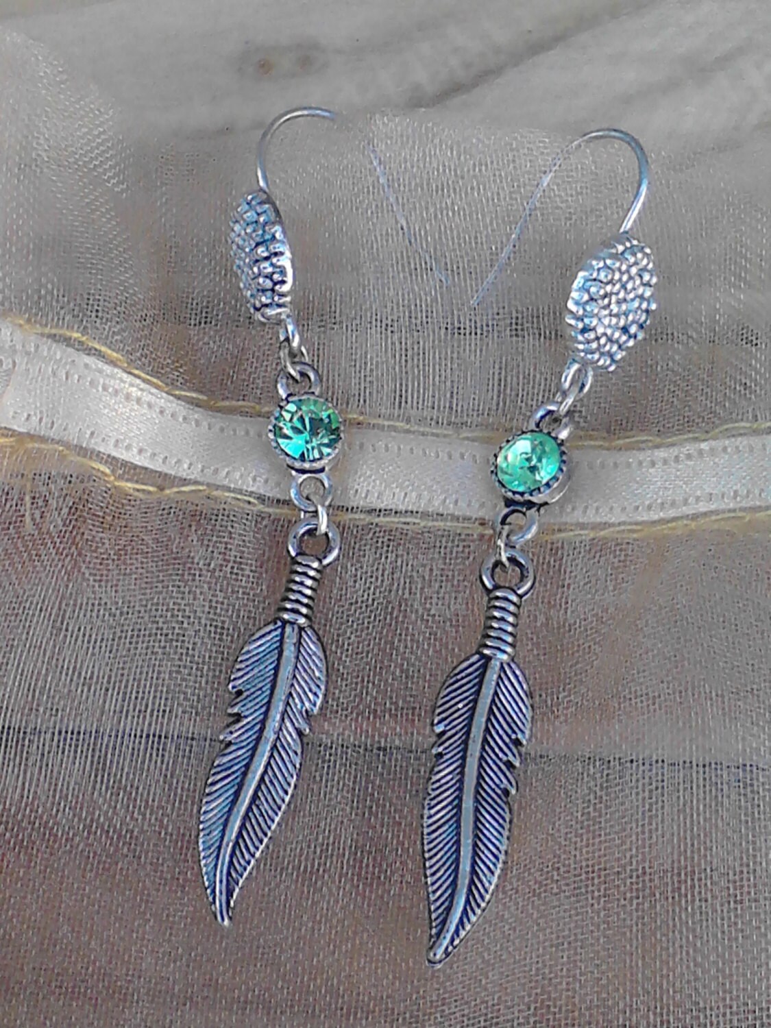 Green Swarovski crystal feather earrings