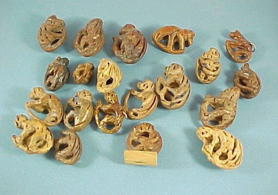 Vintage Carved Peach Pit Monkeys Biting Their Tails Folk Art
