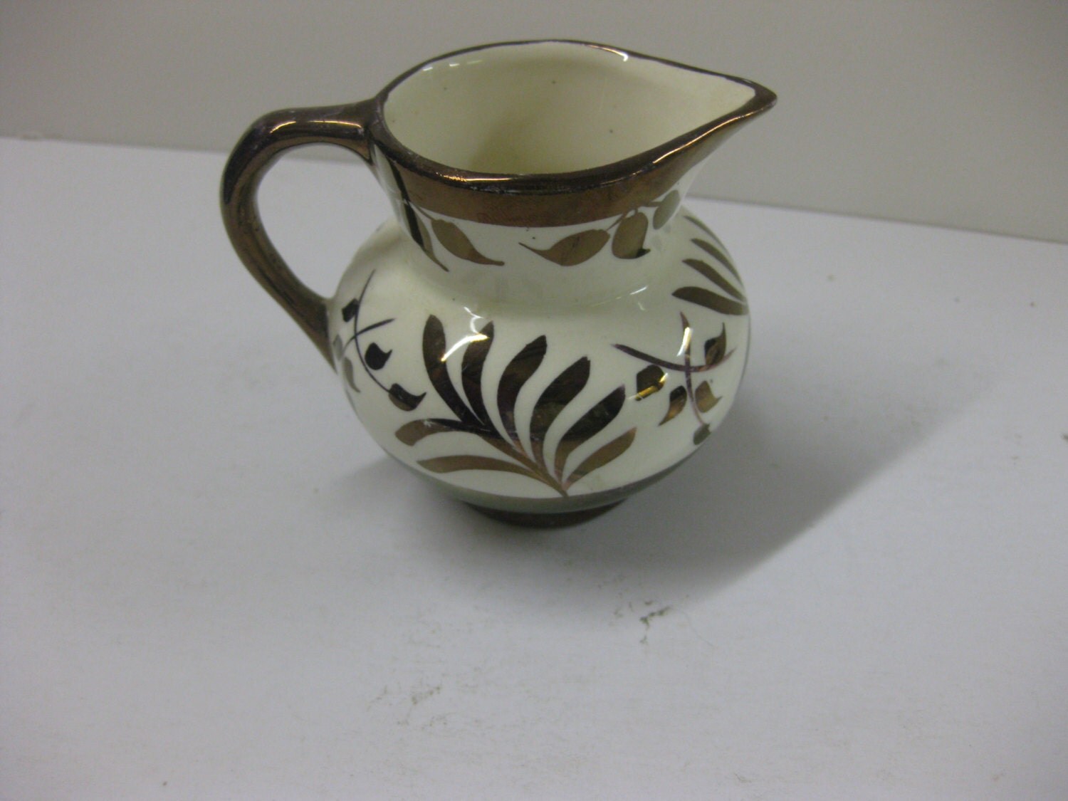 copper luster miniature pitcher – Haute Juice