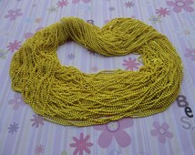 Popular items for yellow ball necklace on Etsy