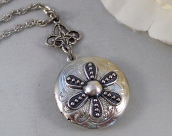 Silver daisy locket | Etsy