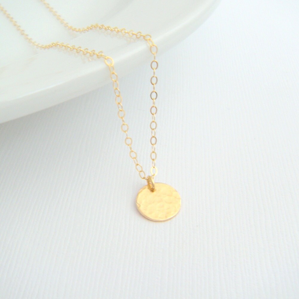 tiny gold necklace. small hammered circle disc. 14k gold
