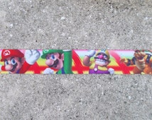 Popular items for mario ribbon on Etsy