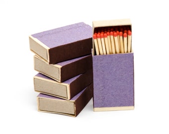 Match box wooden matches with orange heads striker from two