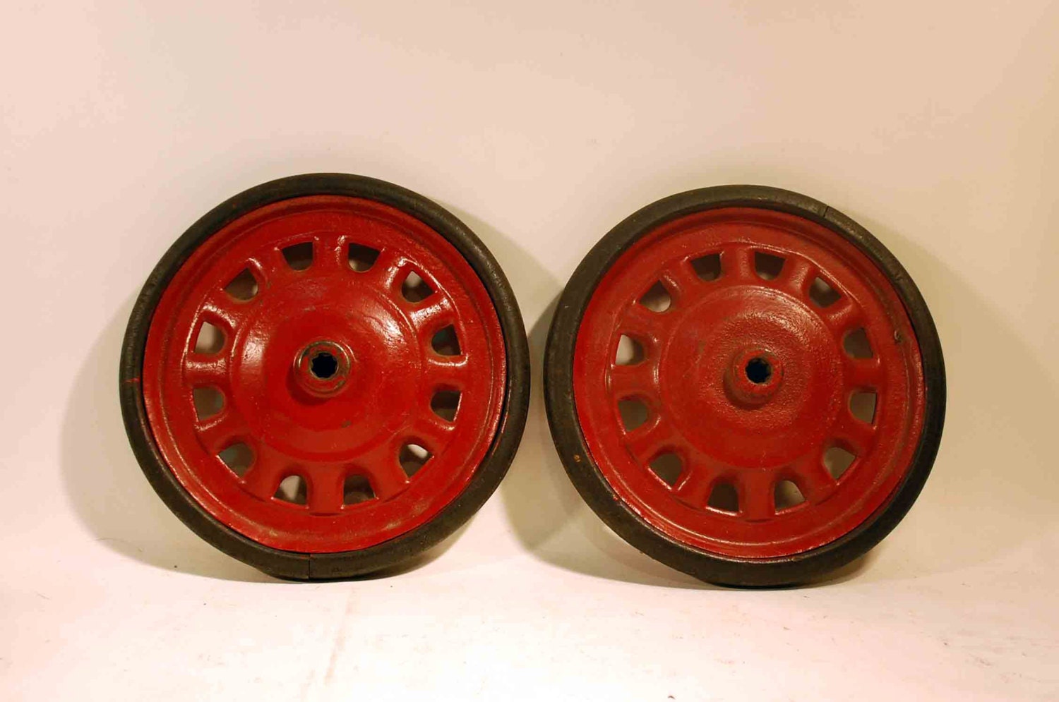 two vintage cast iron wheels red painted metal and solid rubber tires 9 ...
