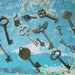 KEY COLLECTION13 pieces assorted antiqued bronze/silver key