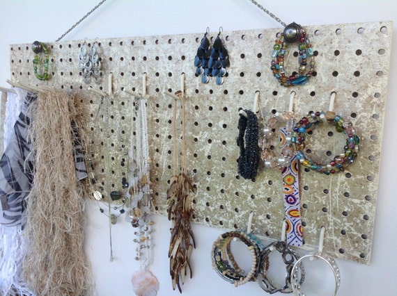 Gold pegboard jewelry organizer upcycled by YouMatterDesigns