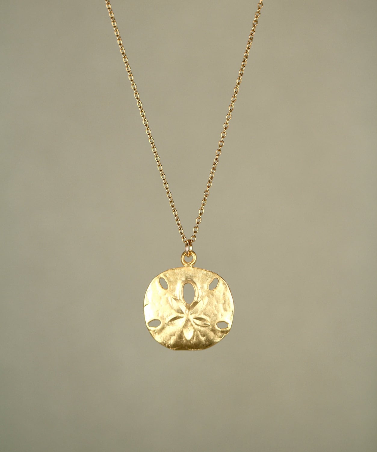 Gold sand dollar necklace delicate necklace a dainty gold