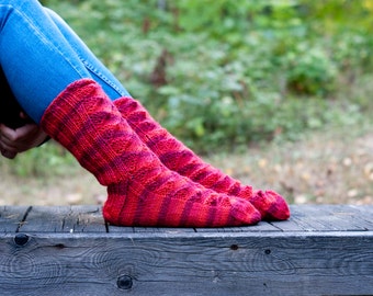 Hand knitted socks in warm wool blend yarn. Pumpkin orange by Varm