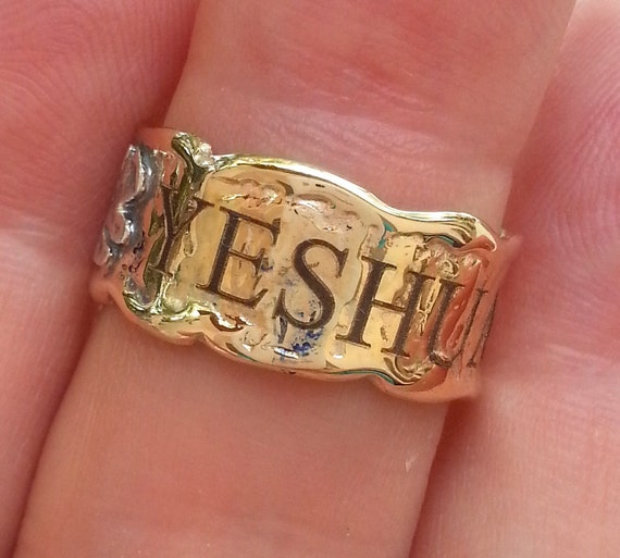 Yeshua gold band ring 14 kt ring decorated with a silver Fig