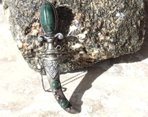 Popular items for dagger brooch on Etsy