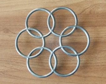 Round metal trivet | Etsy