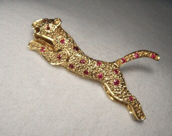 Popular items for gold jaguar on Etsy