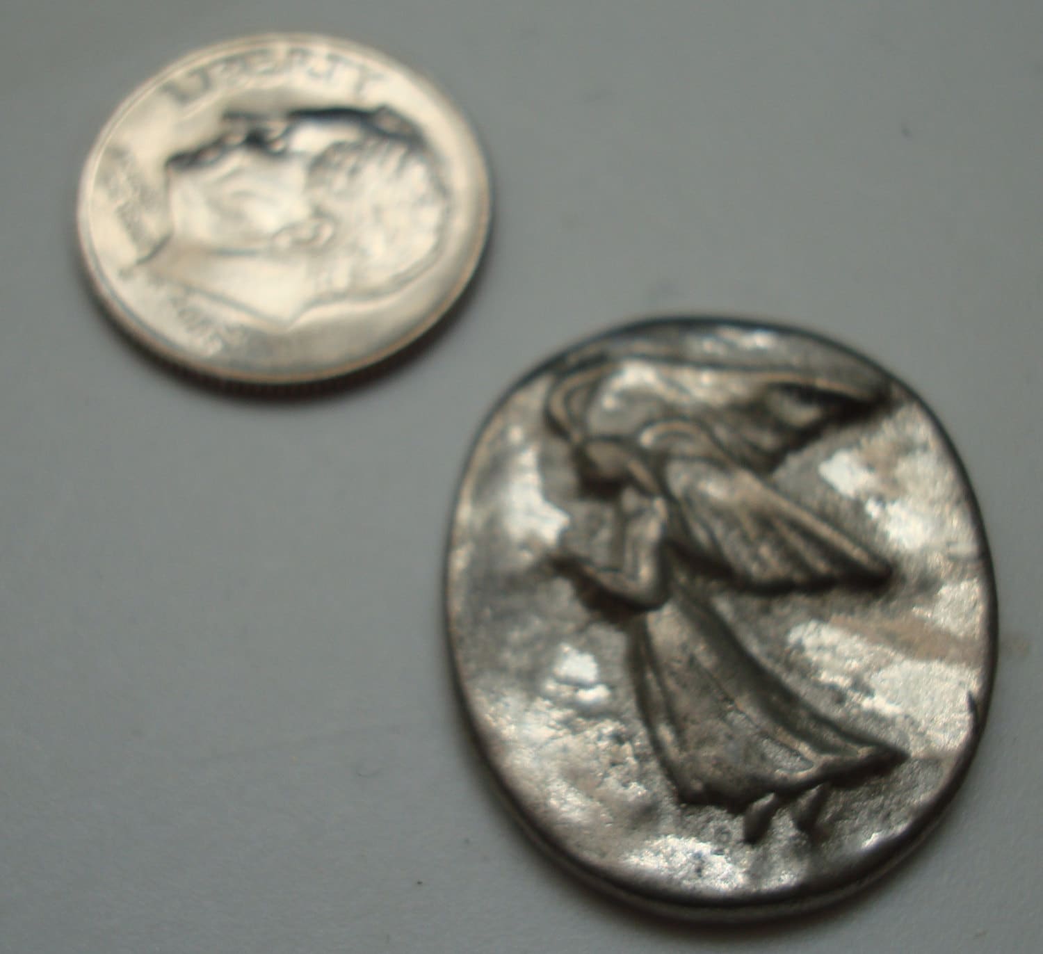 ANGEL motif pressed coin from VENDING MACHINE. — this is not a real ...