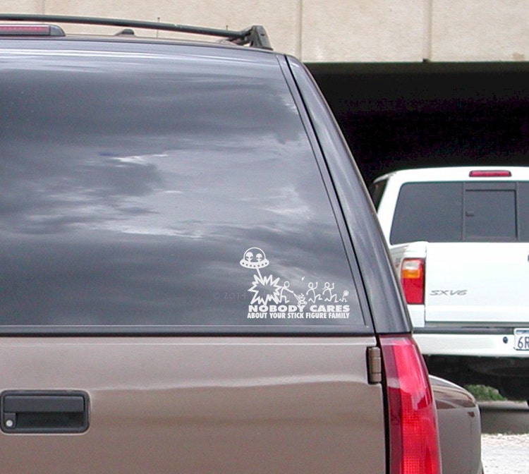 Alien Martians zap your stick figure family car by ValdonImages