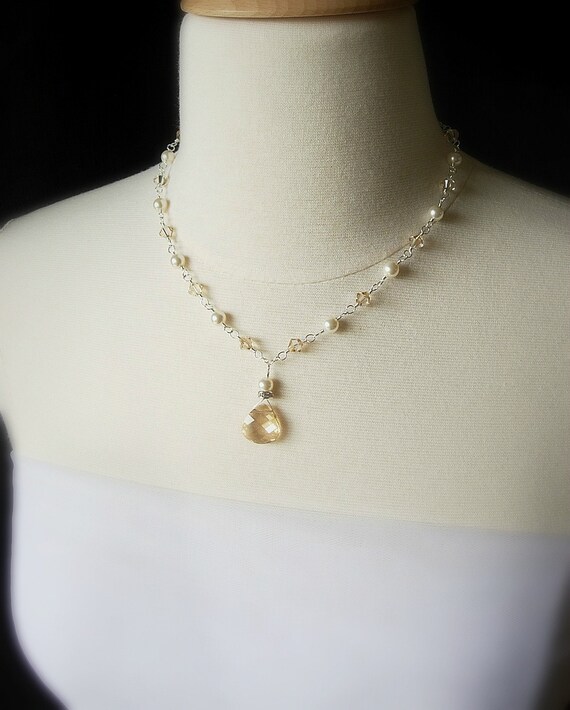 Items similar to Swarovski Golden Shadow Crystal Briolette, Cream Pearl ...
