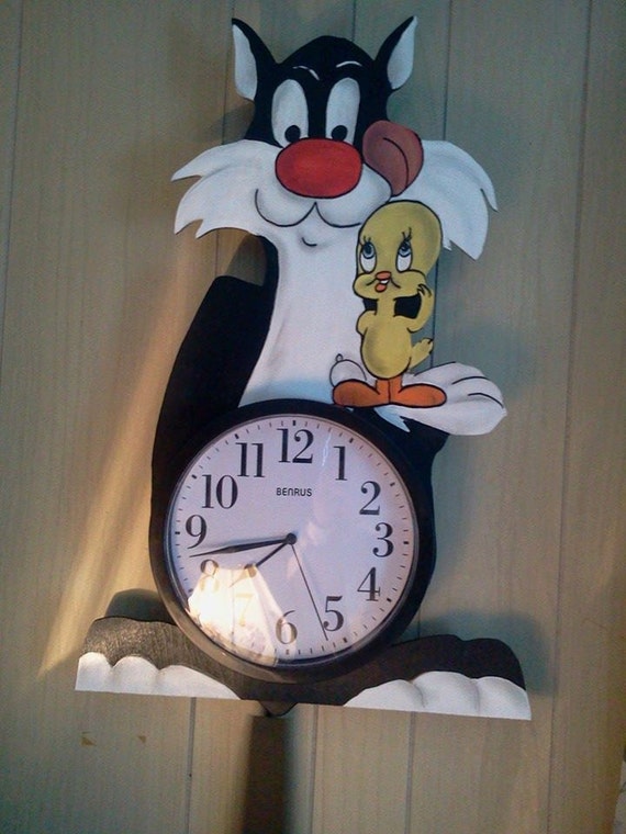 Items similar to Looney Tunes Sylvester and tweety Pendulum wall clock ...