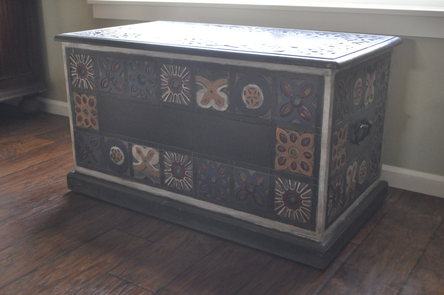Hand carved and finish decorative storage trunk. Colorful flowers ...