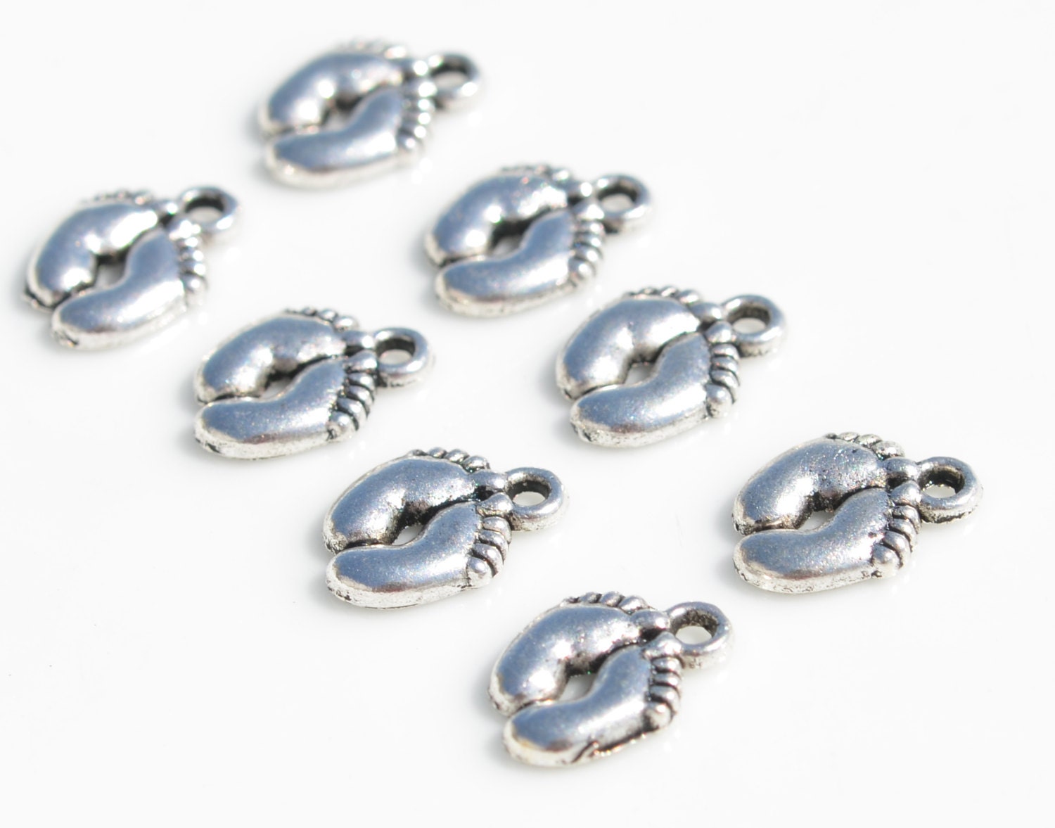 BULK 50 Little Silver Feet Charms SC1891 by LorettasBeads on Etsy