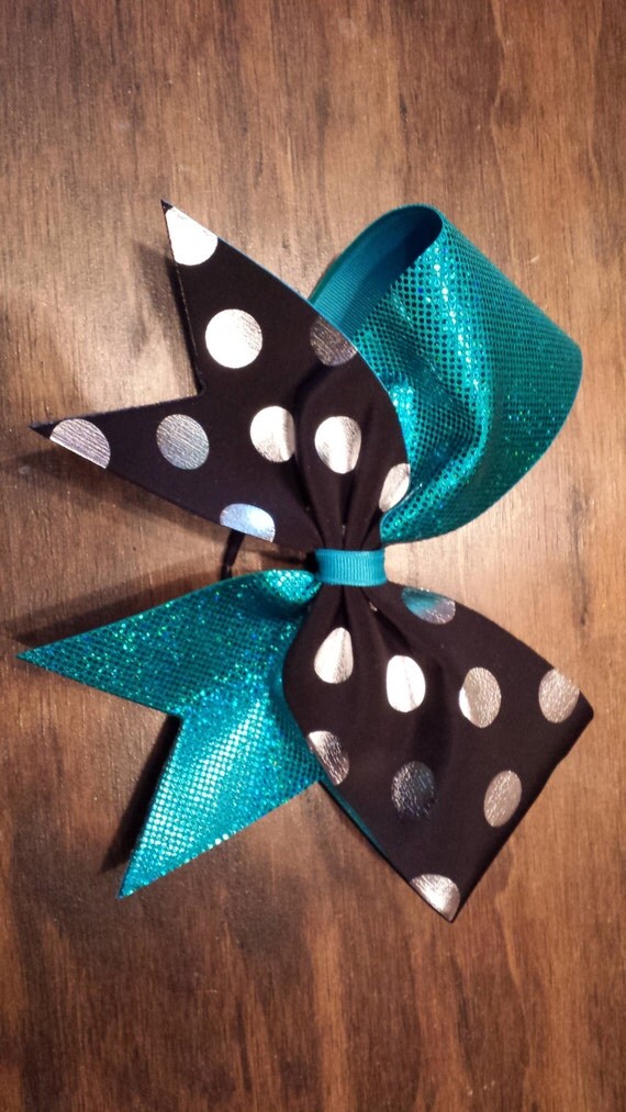 Teal black and polka dots cheer bow.