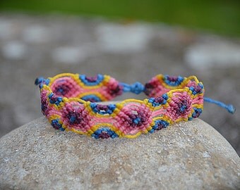 Items similar to multicolor macrame circle pendant with beads on Etsy