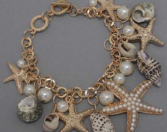 Popular items for shell charm bracelet on Etsy