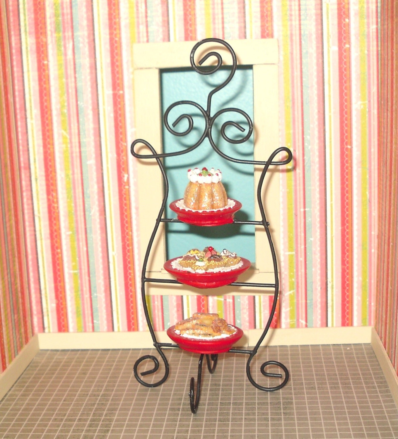 Miniature dollhouse black metal bakers’s rack with sweets – Haute Juice