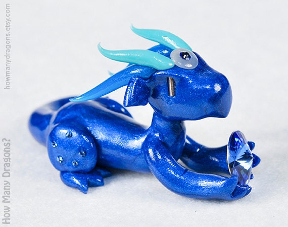 September birthstone dragon with sapphire gem by HowManyDragons