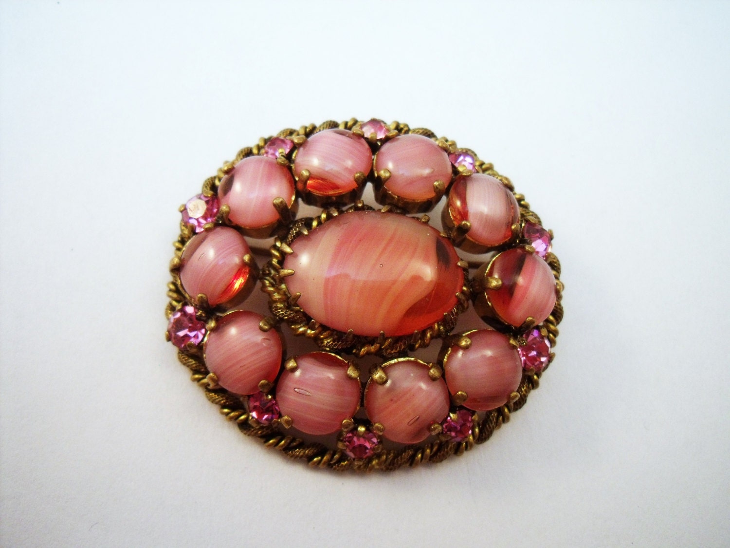 Pink art glass cabochon brooch in an antique gold tone setting – Haute ...