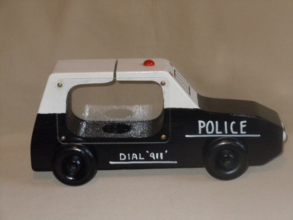 Police Car piggy bank with see thru sides.