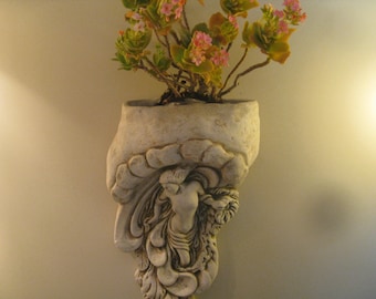 4 Faces planter by ConcreteDesignStudio on Etsy