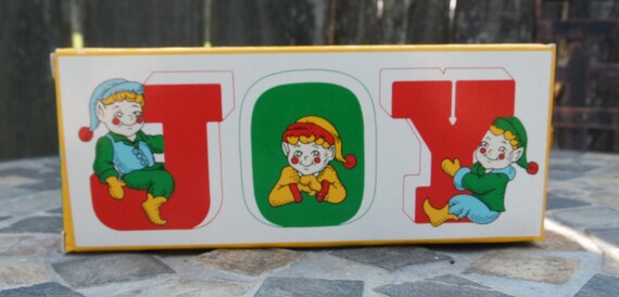 Vintage Avon Joy Elf Candles in original box