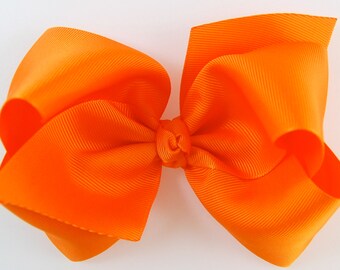 Popular items for orange hair bows on Etsy