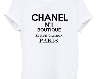 Popular items for chanel t shirt on Etsy