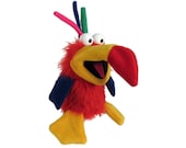 Fuzzy squeaky hand puppets. Hand Made in Canada by DiaboloPuppet