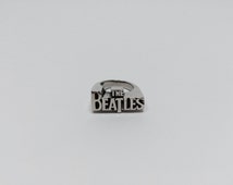 Popular items for beatles jewelry on Etsy