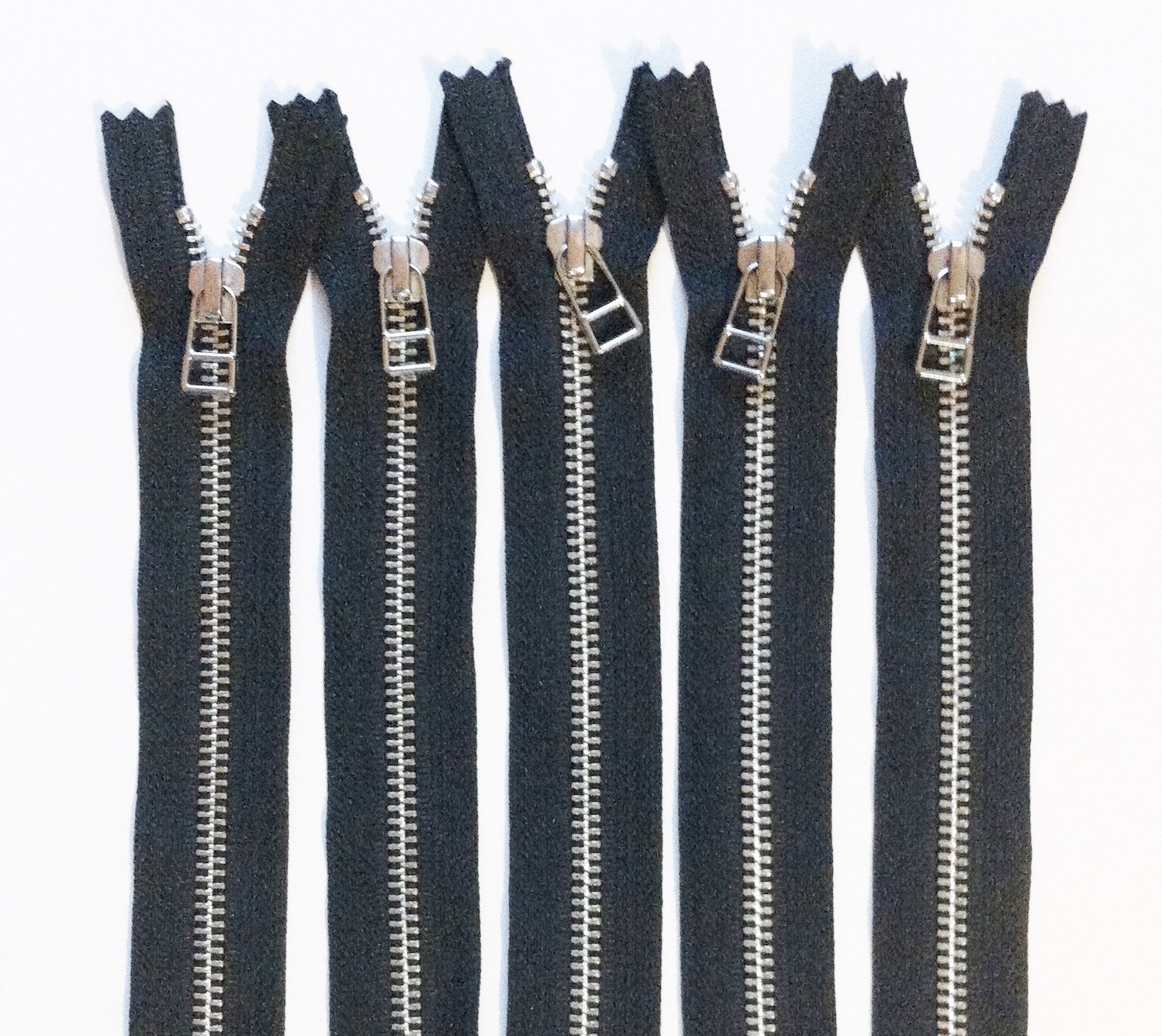 YKK metal zippers with nickel teeth and DHR Wire style pull