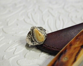 Popular items for elk tooth ring on Etsy