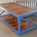Industrial style riveted steel and reclaimed wood coffee table